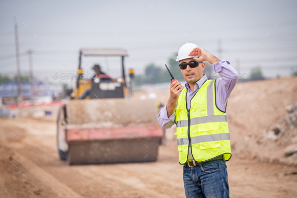 Construction engineer wear safety uniform under inspection and survey ...