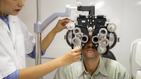Ophthalmologists use special machines to measure eyesight. Stock Photo ...