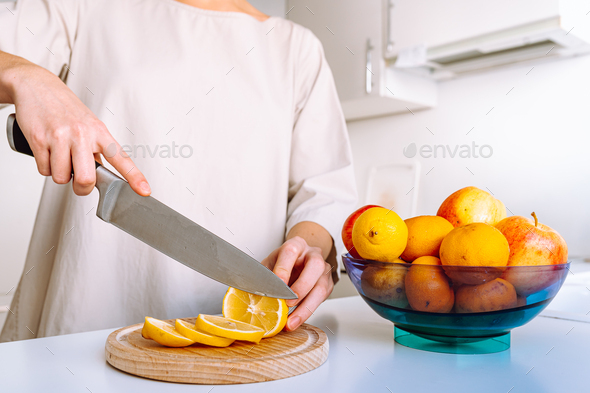 slicing lemon slices Stock Photo by larisikstefania | PhotoDune