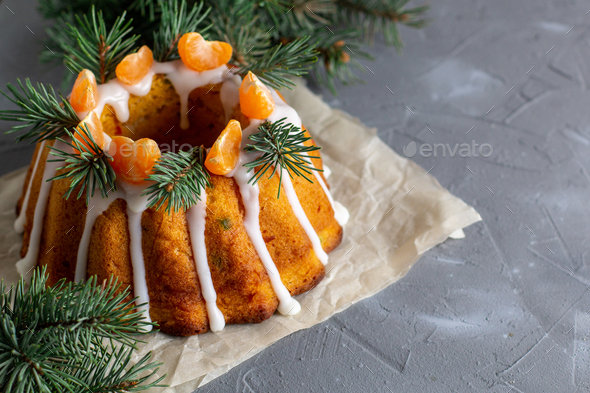 Homemade Christmas cake with candied fruits decorated with icing ...