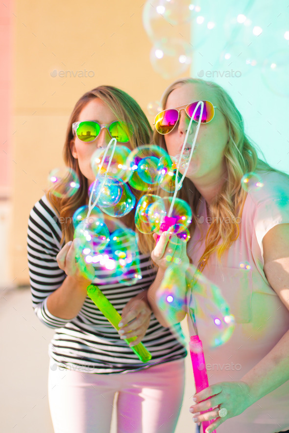 Best friends celebrating a birthday together Stock Photo by breejeanjohnson