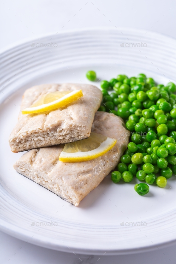 Vegan Plant based fish, fishless fillets with green peas Stock Photo by ...