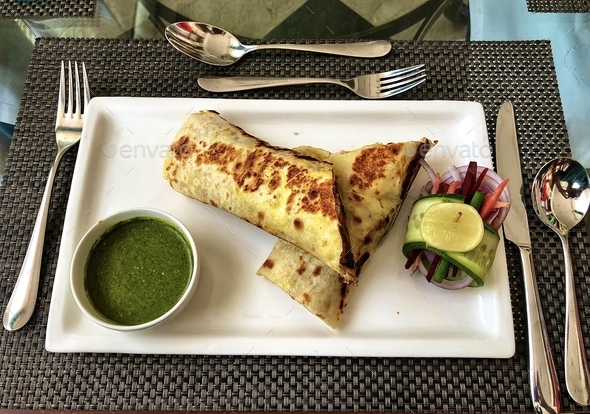 Indian Kati Roll - Warm paratha bread filled with skewer roasted kebab ...