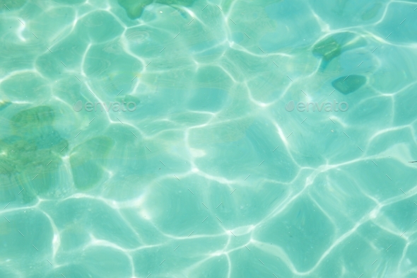 Textured surface of shallow ocean water Stock Photo by heatherdeffense