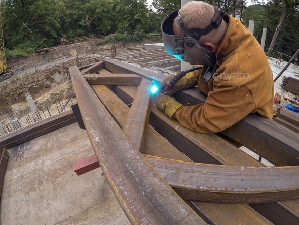 Welding work, welder welding metal material in heavy industry ...