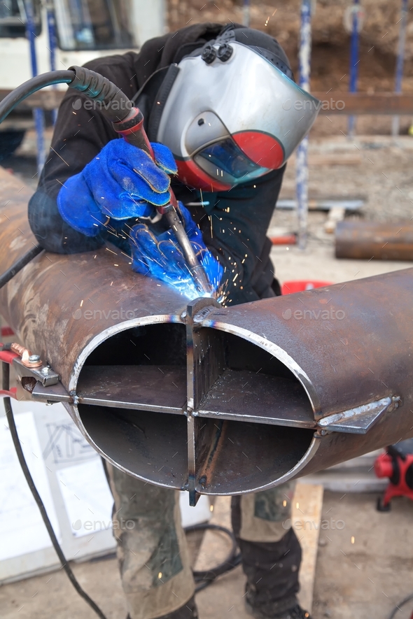 Welding work, welder welding metal material in heavy industry ...