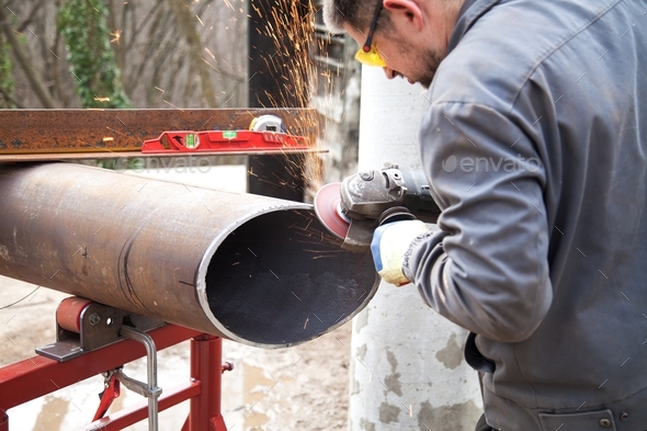 Cutting steel heavy industry by electric flex Stock Photo by Shandor_gor