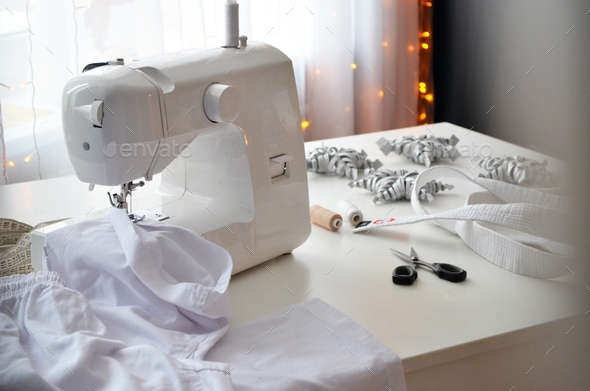 Overhead workplaces. sewing machine Stock Photo by nata_llo | PhotoDune