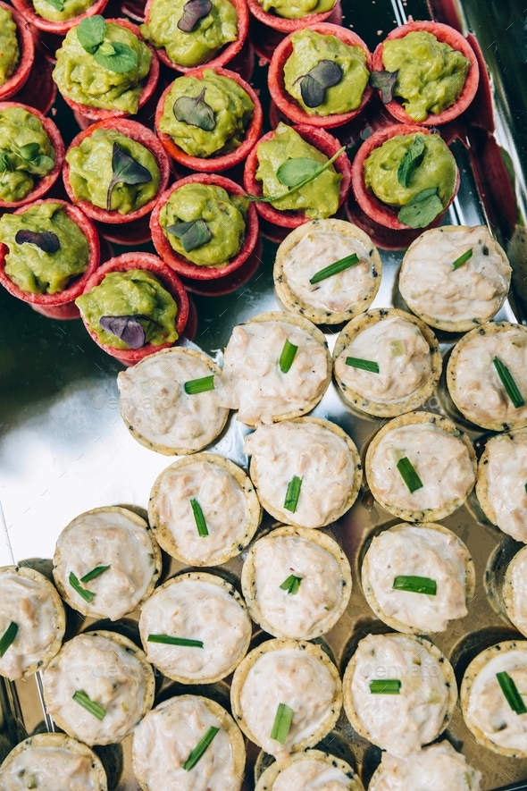 Mini pastry bowls with different creamy fillings. Food catering buffet ...