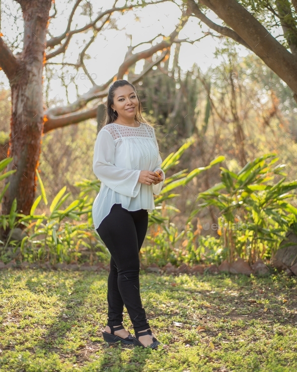 Full body sunset portrait of young mexican woman. Stock Photo by ...
