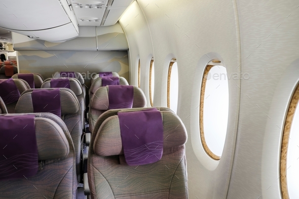 Window seats of an airplane cabin Stock Photo by iportret | PhotoDune