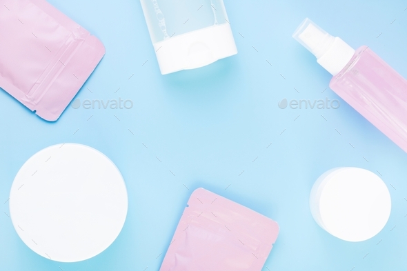 Beauty spa background. Border, frame from cosmetic products on a blue ...