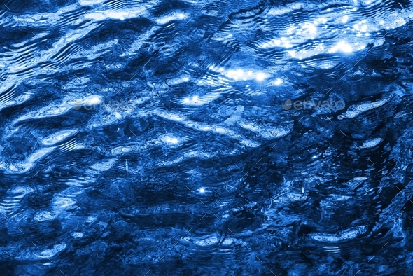 Blue color water background and texture. Glittering surface of clear ...
