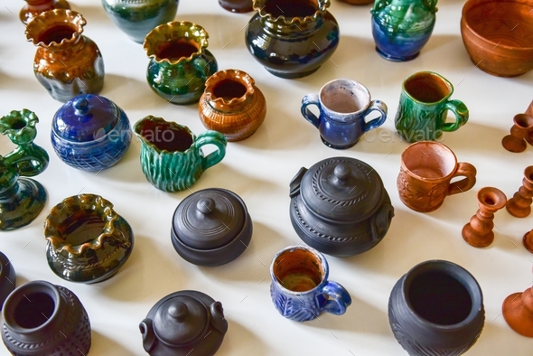 Pottery and pottery made of clay. Handwork Stock Photo by raimonds-k