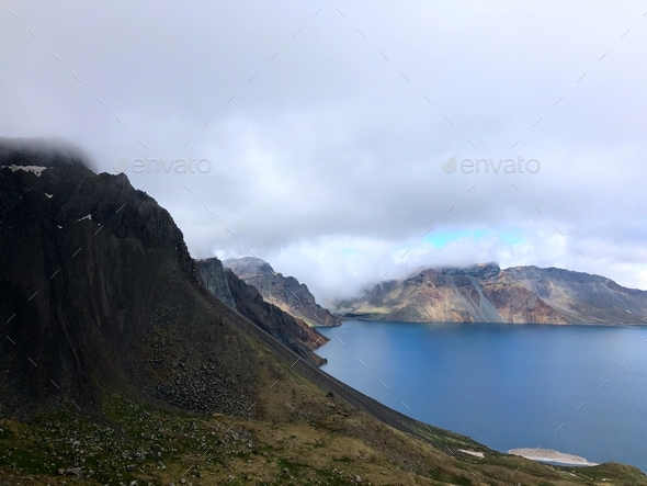 The volcano, beautiful sky and the blue lake (Tianchi) on the top of ...