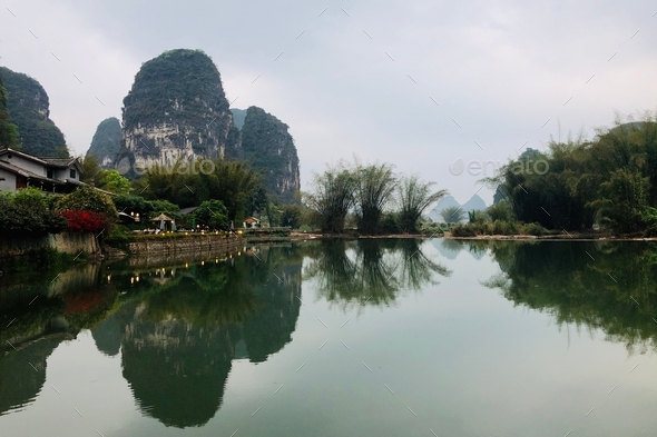 The river and green mountains of different shapes, the famous beautiful ...