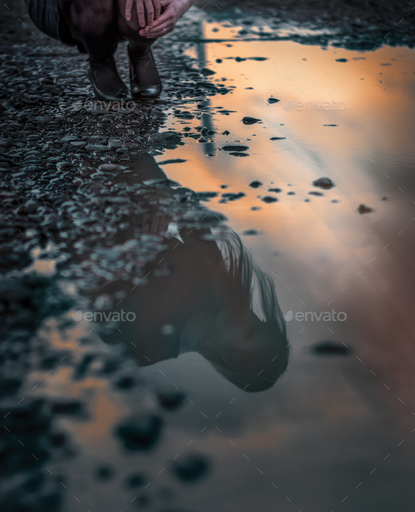 Reflection girl in the moody water. Stock Photo by Samio20 | PhotoDune