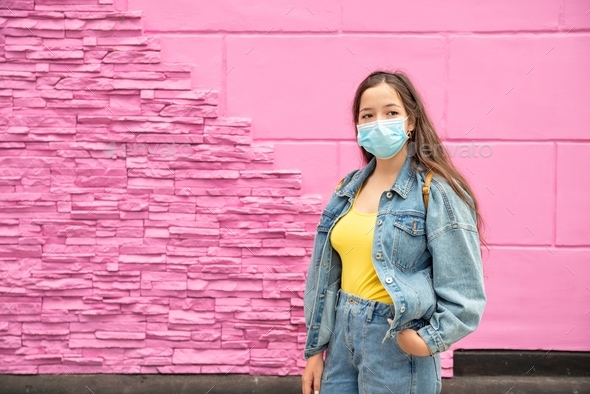 Masked teenage girl - protection against influenza virus. Stock Photo ...