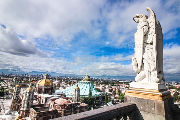 St Michael the archangel statue overlooking the Basílica de Guadalupe ...