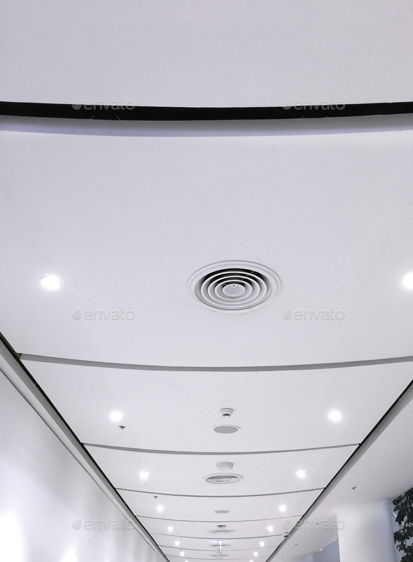 Low Angle View of White Modern Ceiling with Conditioned Air Diffusers ...