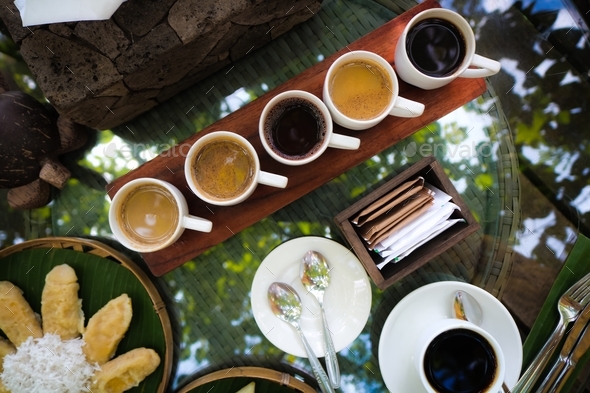 Traditional Balinese experience at a coffee plantation. Stock Photo by ...