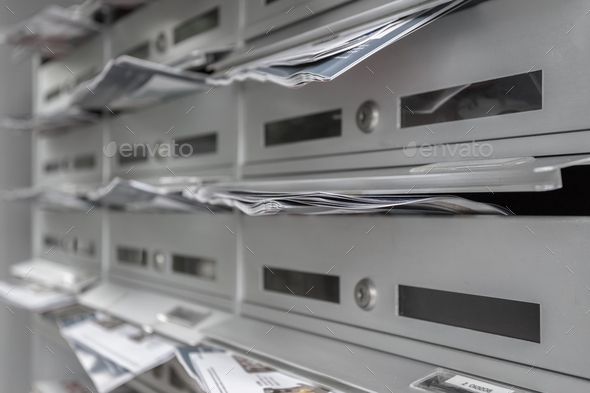 Mailboxes filled Stock Photo by KYNASTUDIO | PhotoDune