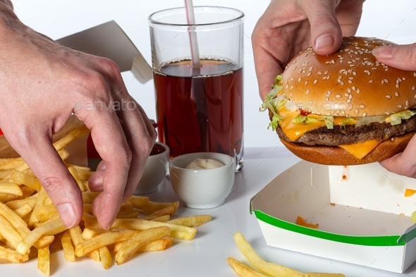 home delivery, fast food. Burgers, french fries in package on white ...