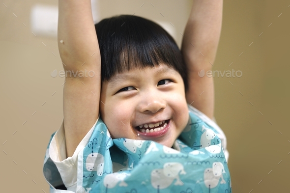 child hands up with smiling face. Stock Photo by raffinboy | PhotoDune