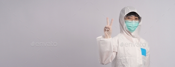 Middle aged asian nurse woman wearing PPE body suit or personal ...