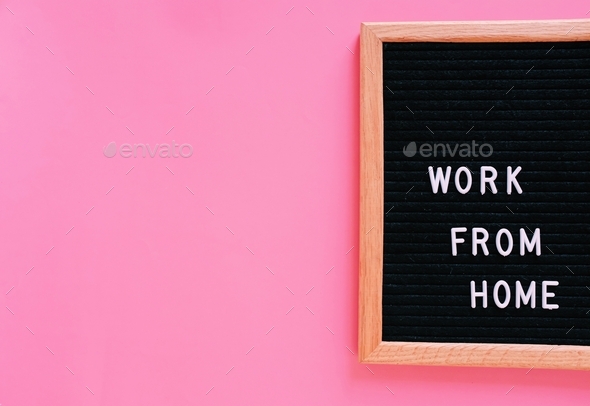 Work from home on notice board with pink background and copy space ...