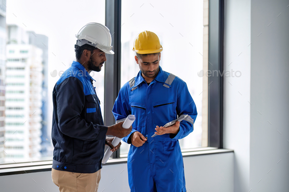 Engineer visit supervisor at building construction site follow up ...