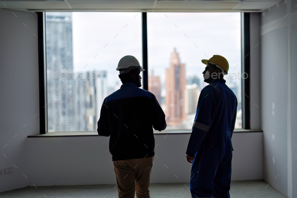 Engineer visit supervisor at building construction site follow up ...