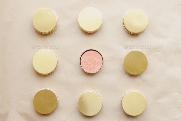 Eco friendly natural solid shampoo in metal cans on papaer background ...
