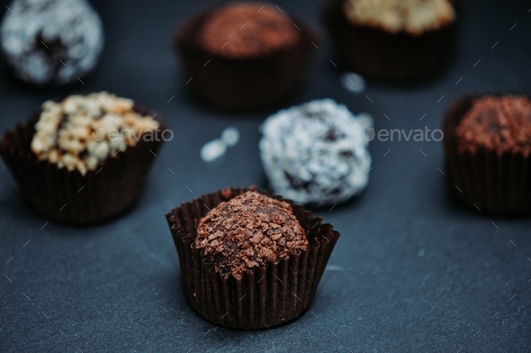 Sweets. Round candies. Chocolate candies. Sweets in coconut. Candies in ...