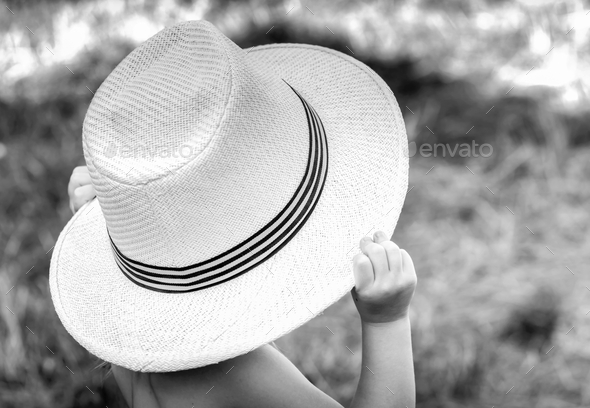 Little child with big white hat. Stock Photo by Dani_Solare | PhotoDune