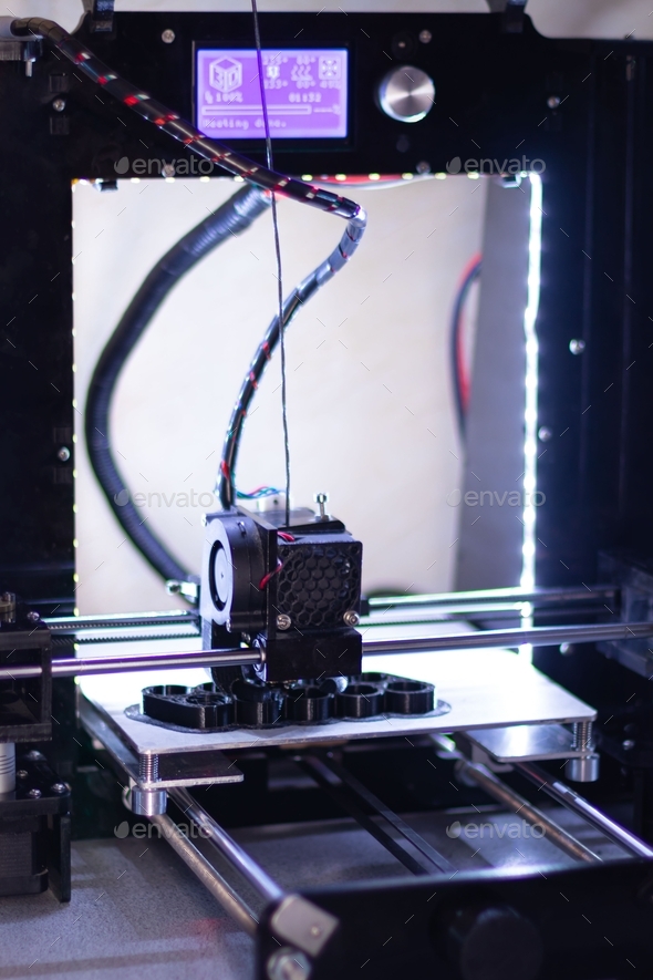 3D Printing process. 3D Printing process. Printing original products on ...