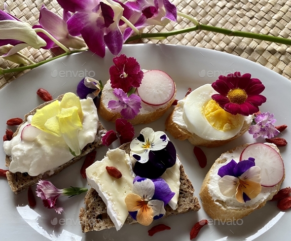 Canapes with edible flowers Stock Photo by irenanna_sowinska | PhotoDune