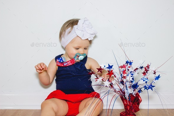 Baby calendar photo shoot for the month of July. Stock Photo by mbannis1