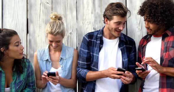 Friends Interacting Using Mobile Phone, Stock Footage | VideoHive