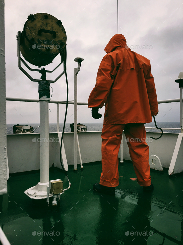 The Hook Man standing on a ship on a rainy day. Stock Photo by LegasC