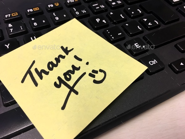 Thank you handwritten note on computer keyboard with smiley face Stock ...