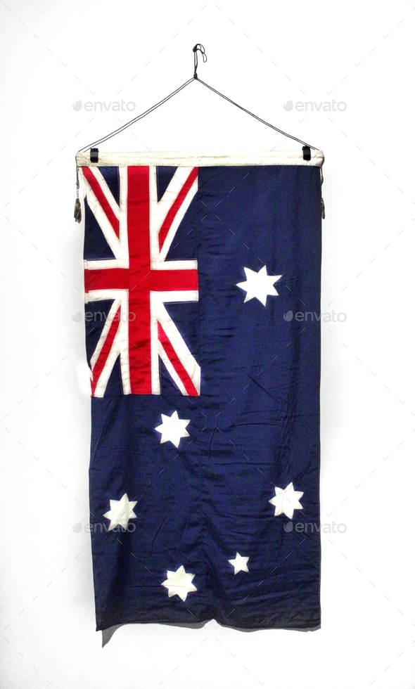 Australian flag hanging on a white wall. Otago Settlers Museum, Dunedin ...