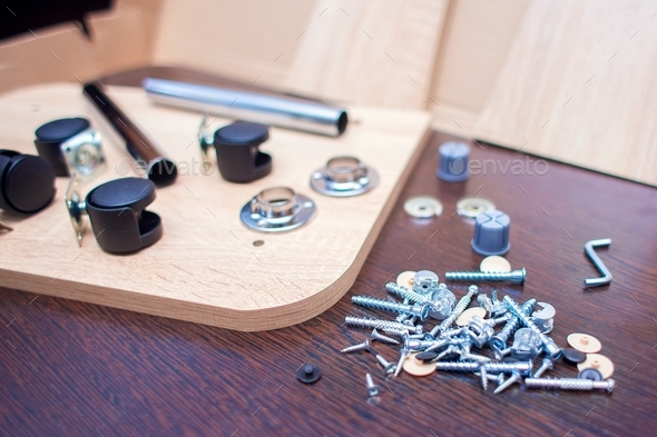 Fasteners for collecting furniture. A set of fasteners for assembling a ...