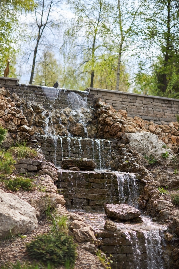 Artificial waterfall in the park Stock Photo by George_Mineev | PhotoDune