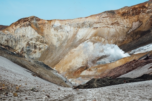 Landscape inside the volcano crater with fumaroles Stock Photo by flaMash