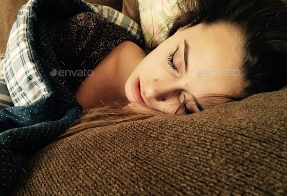 Real people, young woman napping Stock Photo by lynnebook | PhotoDune