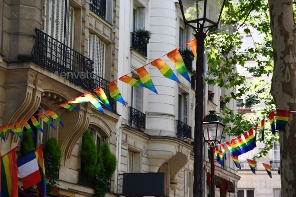 Bright garlands of striped triangle banners in colors of LGBTQ flag on ...