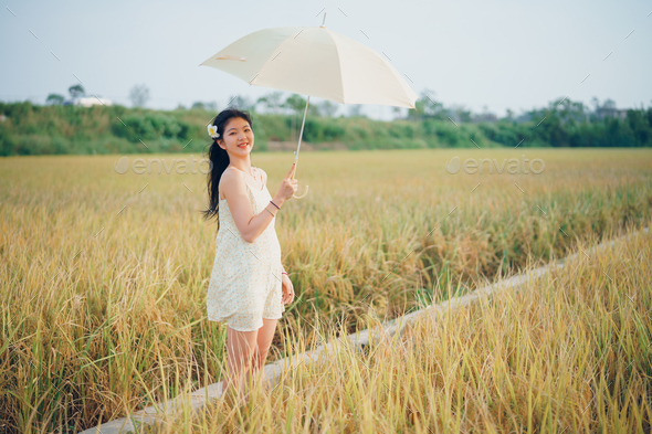 girl walking on rice fields Stock Photo by liufuyu | PhotoDune