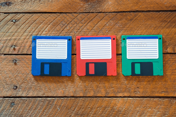 Three floppy disks as used in the 1980s and 1990s, vintage technology ...