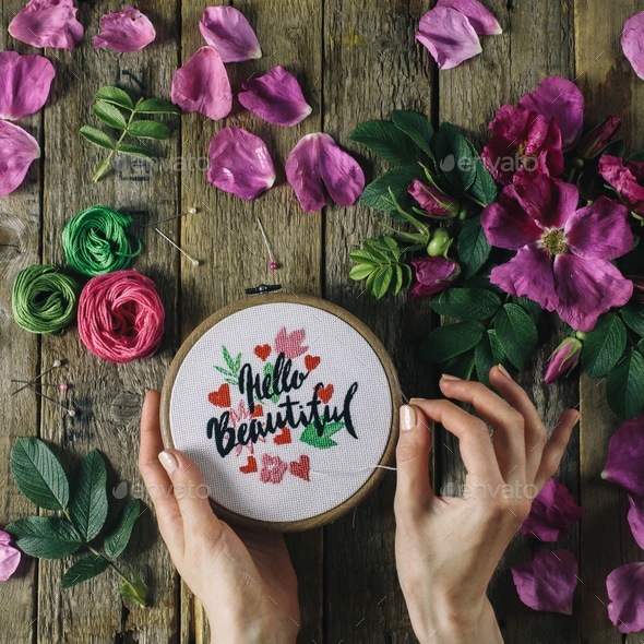 Handmade cross stitch embroidery Hello beautiful in women’s hands with ...